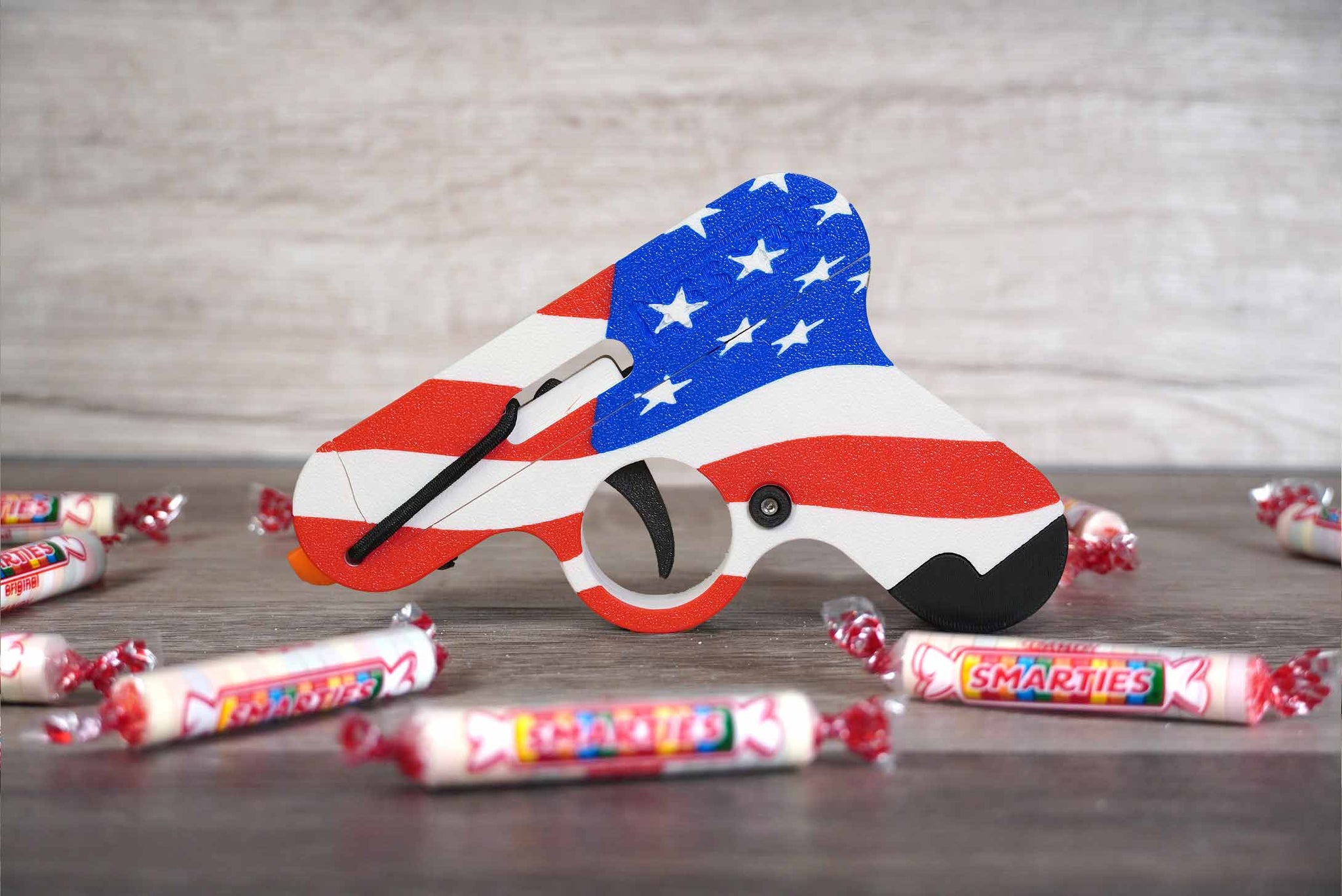 Smartee Gun - Camo - SSM3 - A gun that shoots Smarties Candy! – Wanted ...